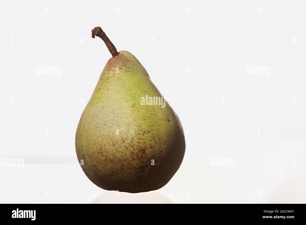 pear standing on a white background Stock Photo - Alamy