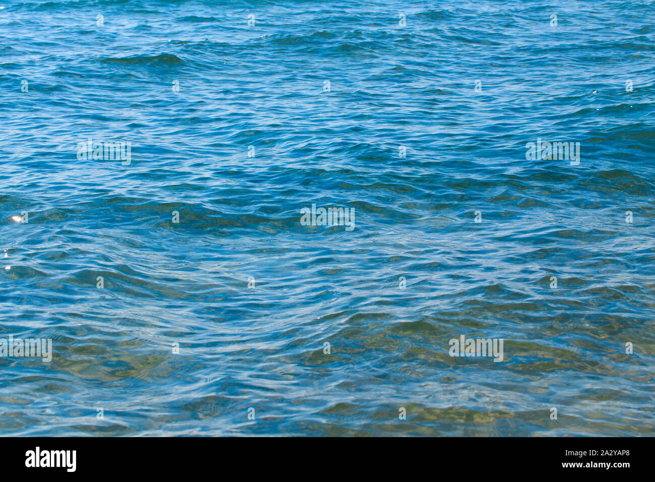 Clear water texture in blue and orange. Background of the ocean and the ...