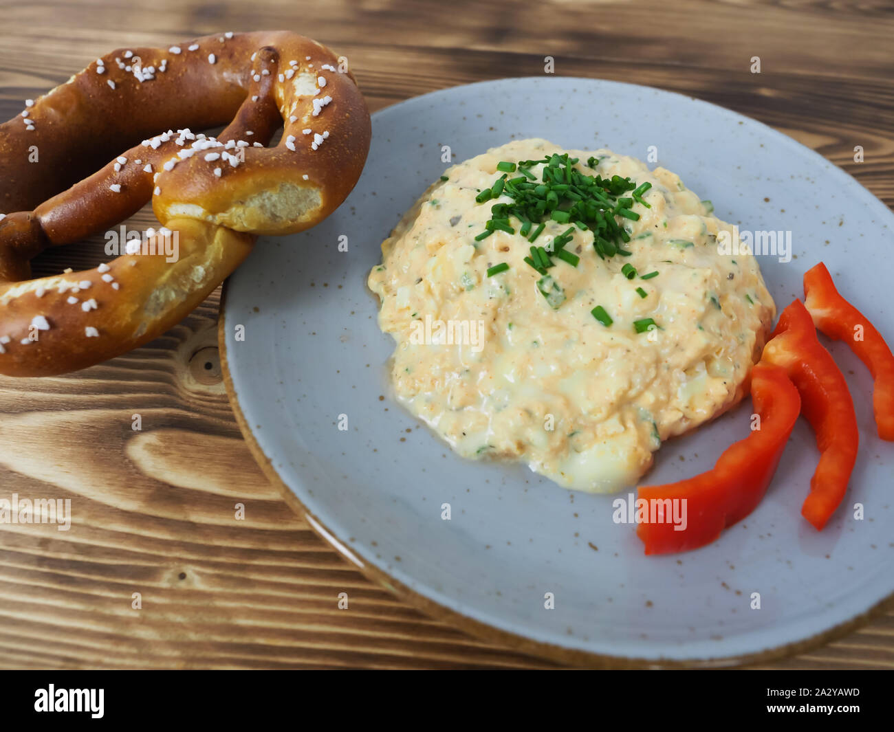traditionally bavarian food appetizer with brezen and cheese paste ...