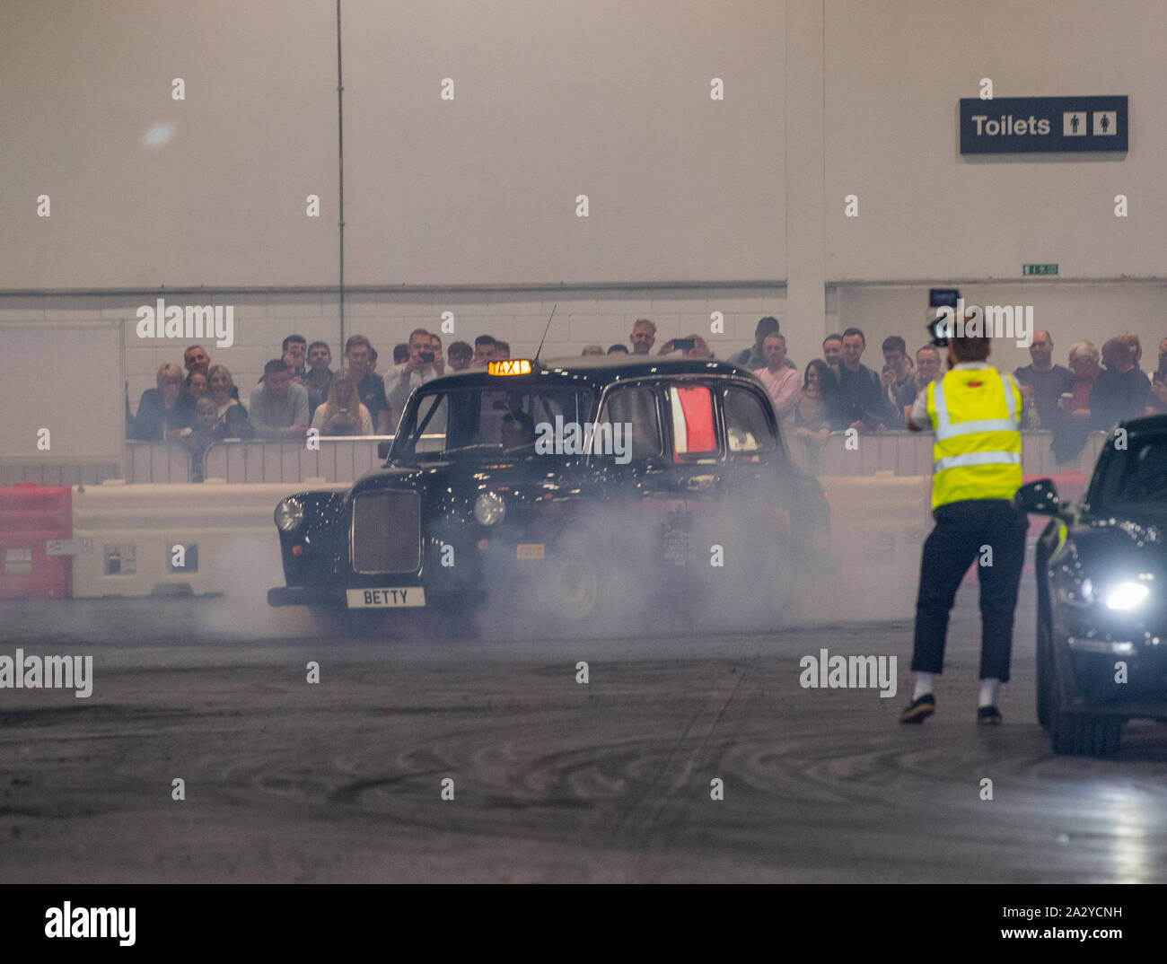 Paul Swift stunt driver, MC'd by Tiff Needell at London Motor Show May ...