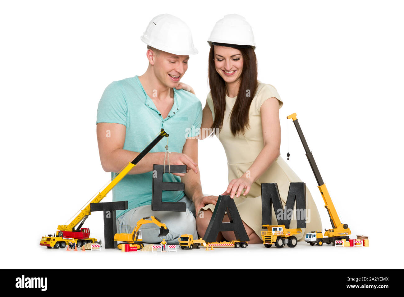 Team work building hi-res stock photography and images - Alamy