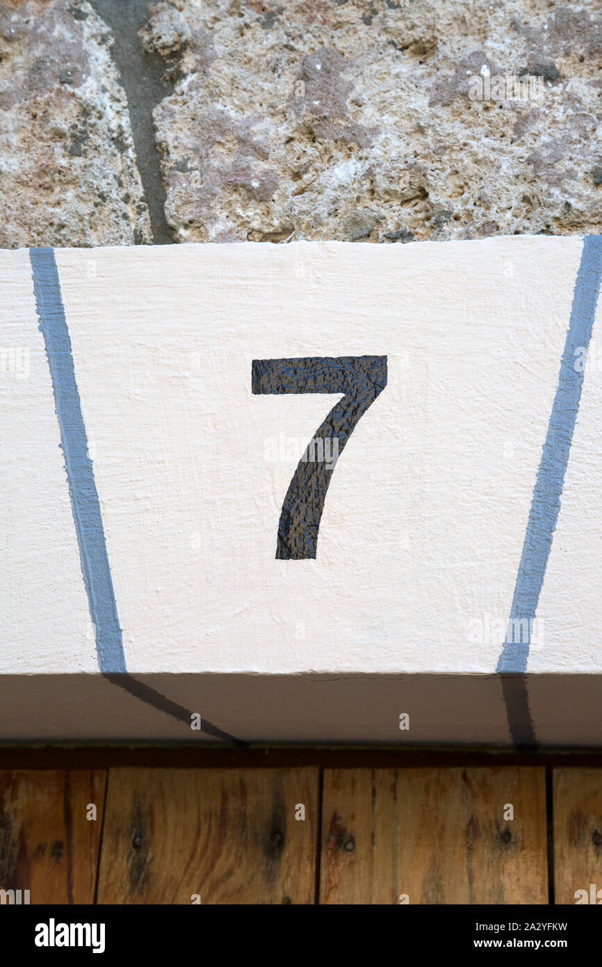 Number Seven above Door Entrance Stock Photo - Alamy