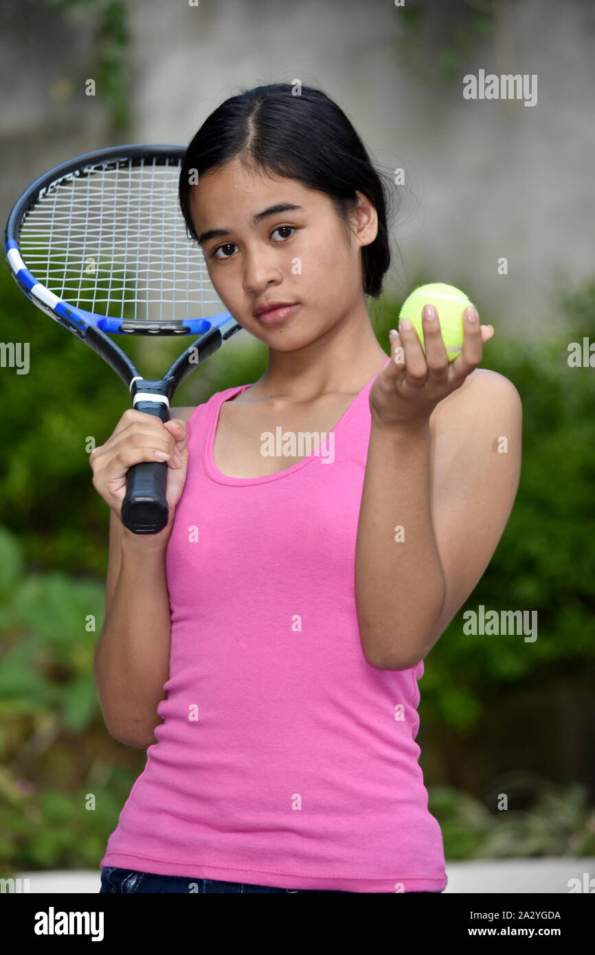Slender Fit Teen Female Athlete Girl Tennis Player With Racket And Ball ...