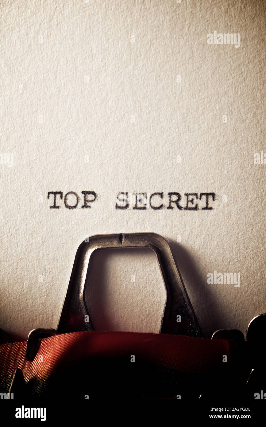 The sentence, Top Secret, written with a typewriter Stock Photo - Alamy