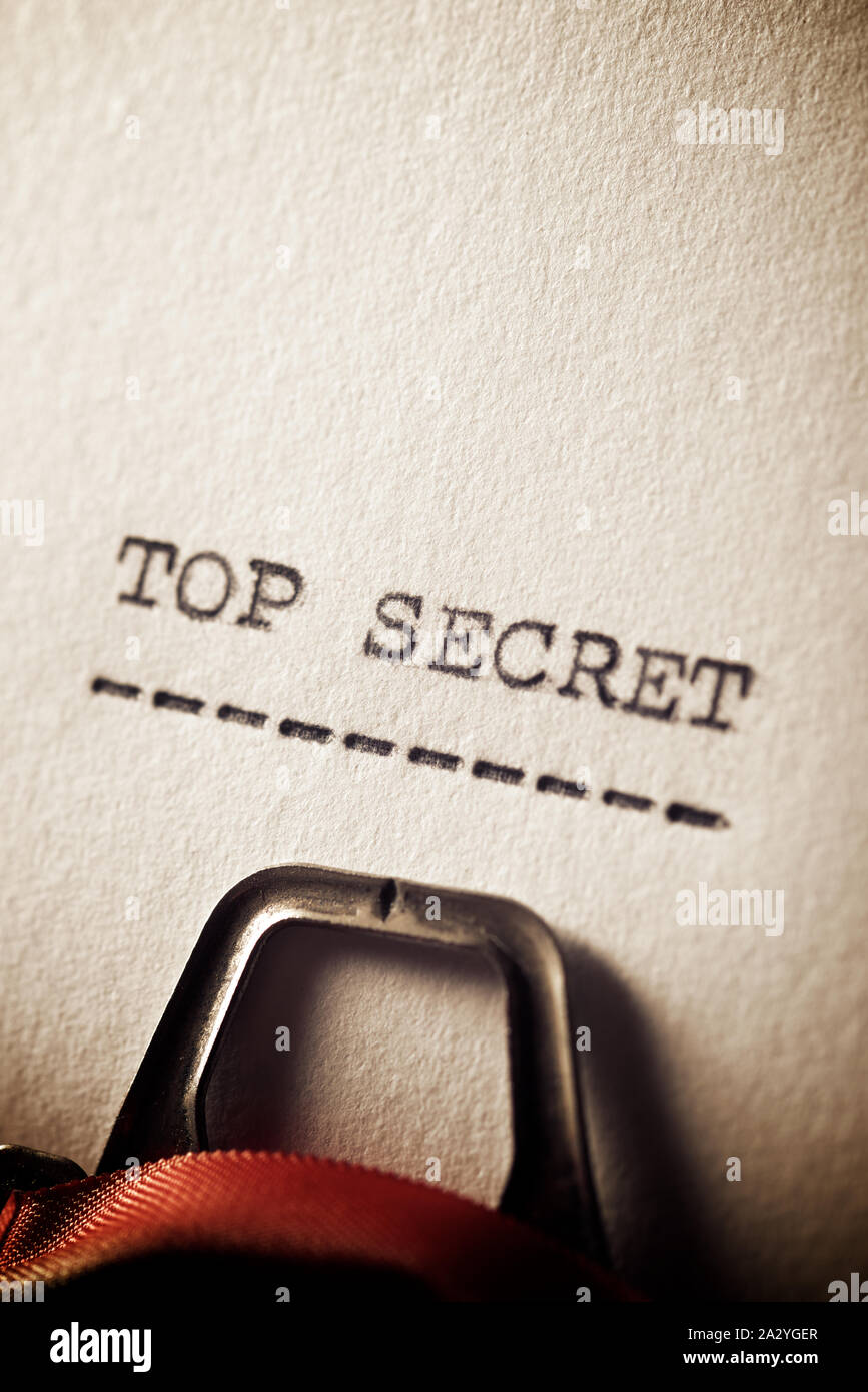 The sentence, Top Secret, written with a typewriter Stock Photo - Alamy