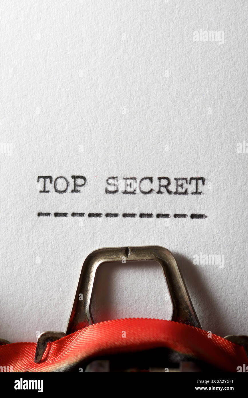 The sentence, Top Secret, written with a typewriter Stock Photo - Alamy