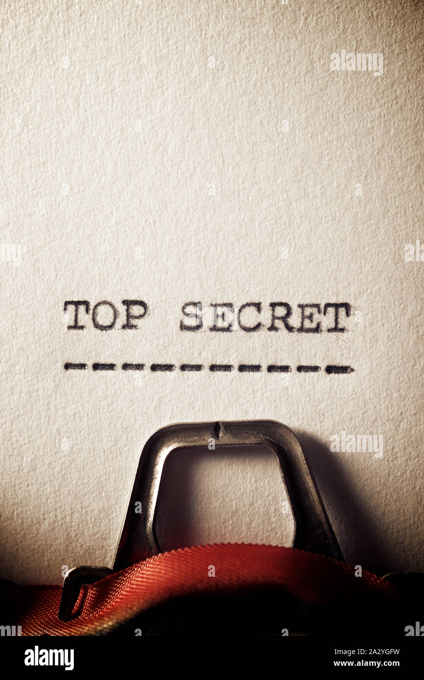The sentence, Top Secret, written with a typewriter Stock Photo - Alamy