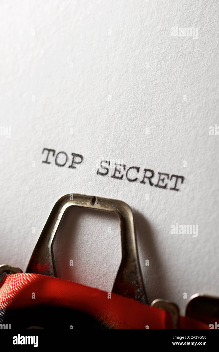 The sentence, Top Secret, written with a typewriter Stock Photo - Alamy