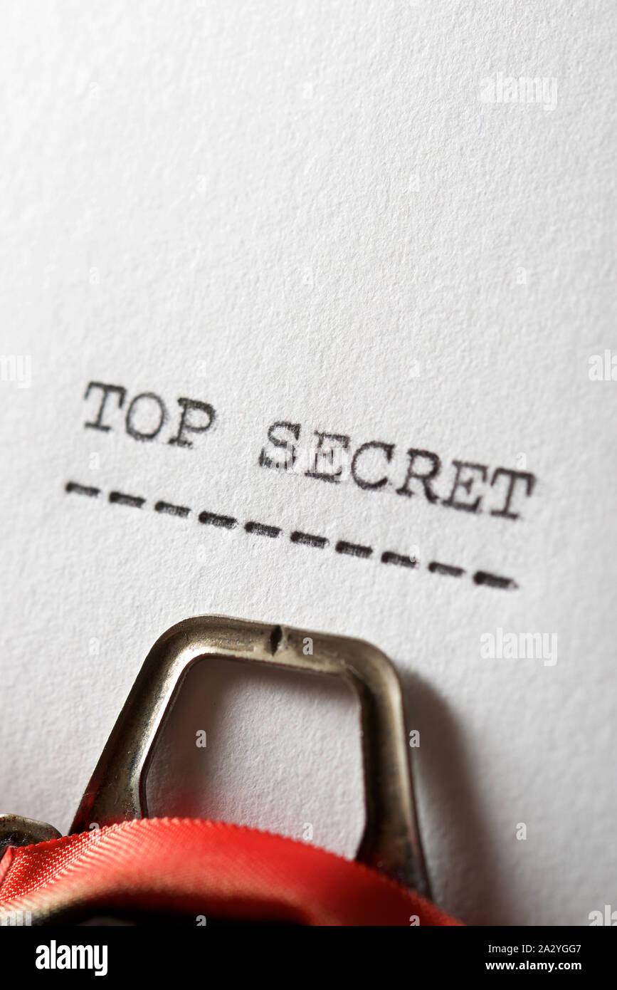 The sentence, Top Secret, written with a typewriter Stock Photo - Alamy
