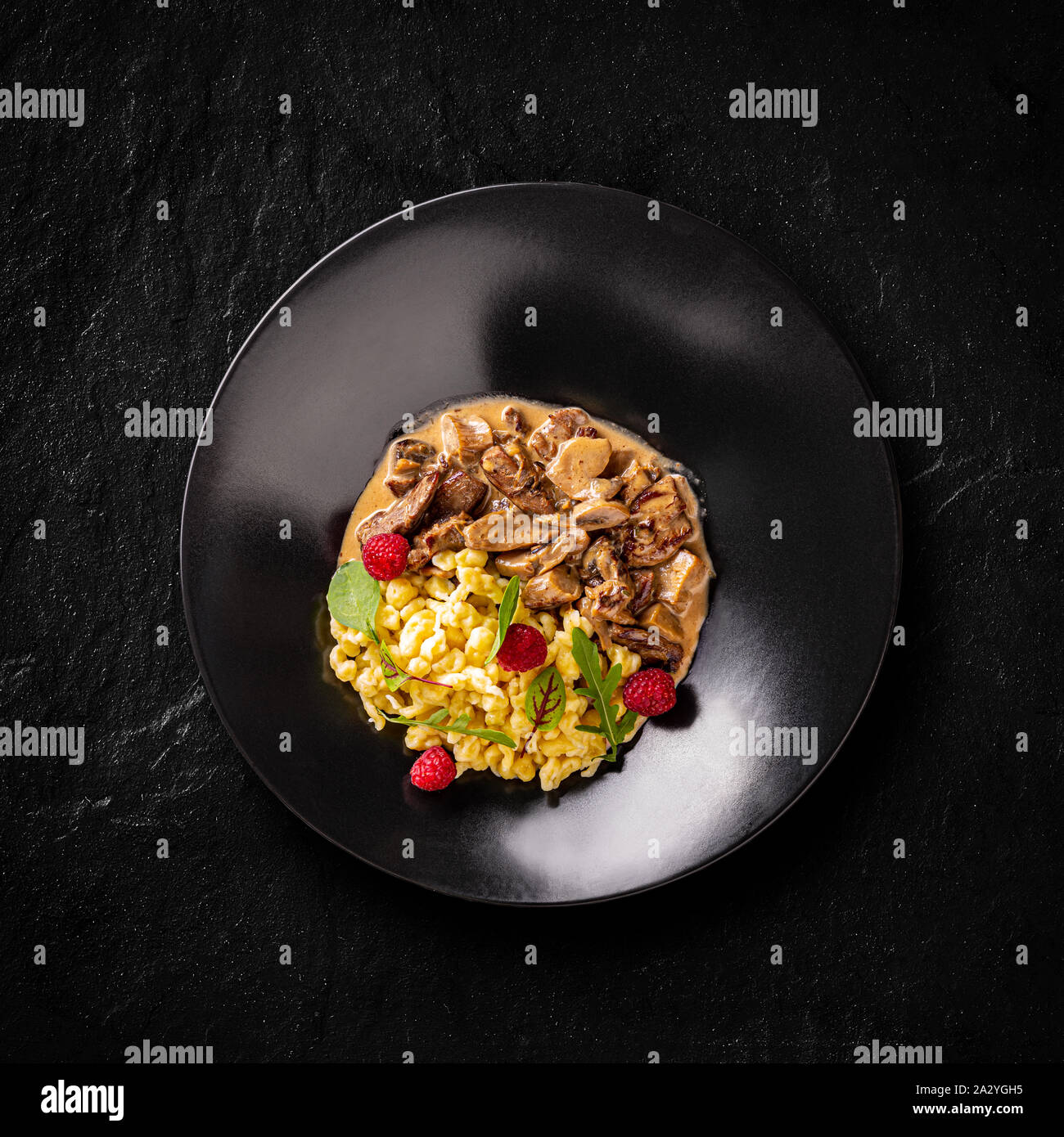 Beef tenderloin stew with thyme, forest mushrooms and homemade egg ...