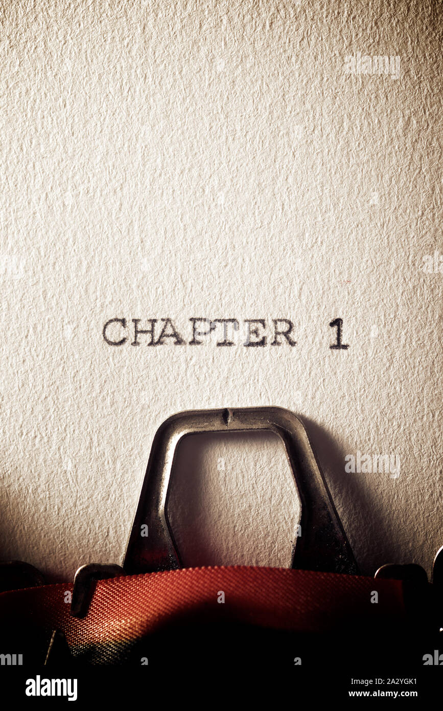 The sentence, Chapter 1, written with a typewriter Stock Photo - Alamy