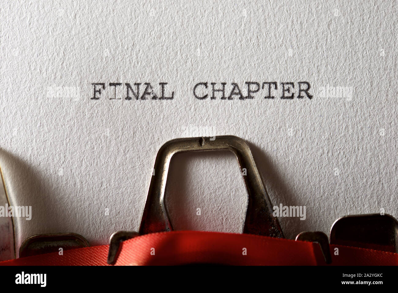 The sentence, Final Chapter, written with a typewriter Stock Photo - Alamy