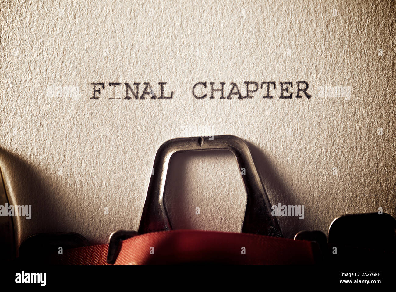 The sentence, Final Chapter, written with a typewriter Stock Photo - Alamy