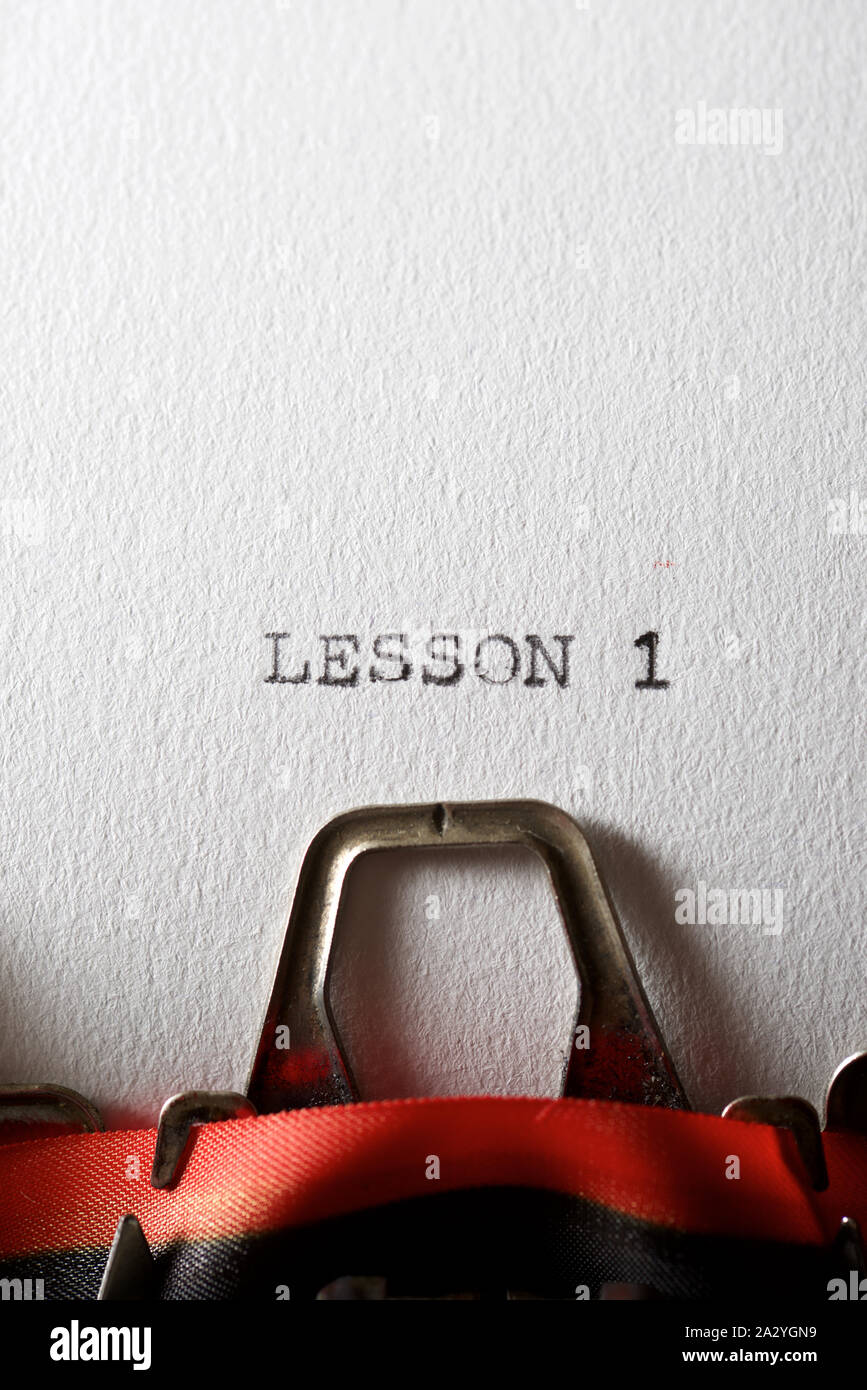 The sentence, Lesson 1, written with a typewriter Stock Photo - Alamy