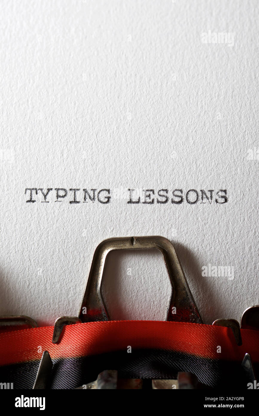 The sentence, Typing Lessons, written with a typewriter Stock Photo - Alamy
