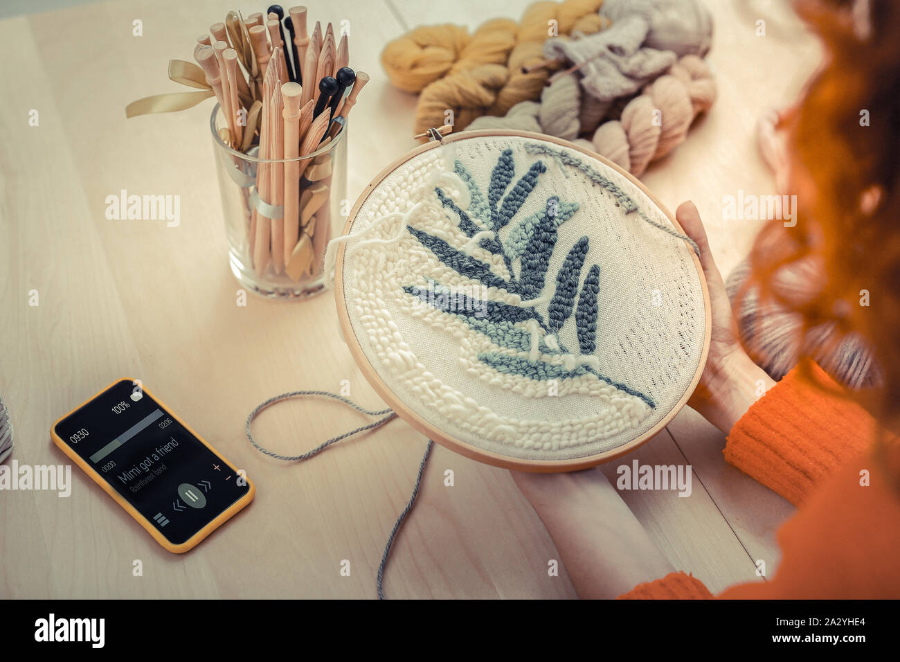 Young female person enjoying her handicraft hobby Stock Photo - Alamy