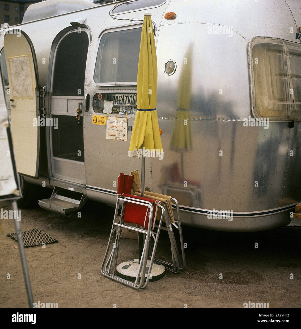 1970s camping. Pictured an American Airstream caravan in aluminium and ...