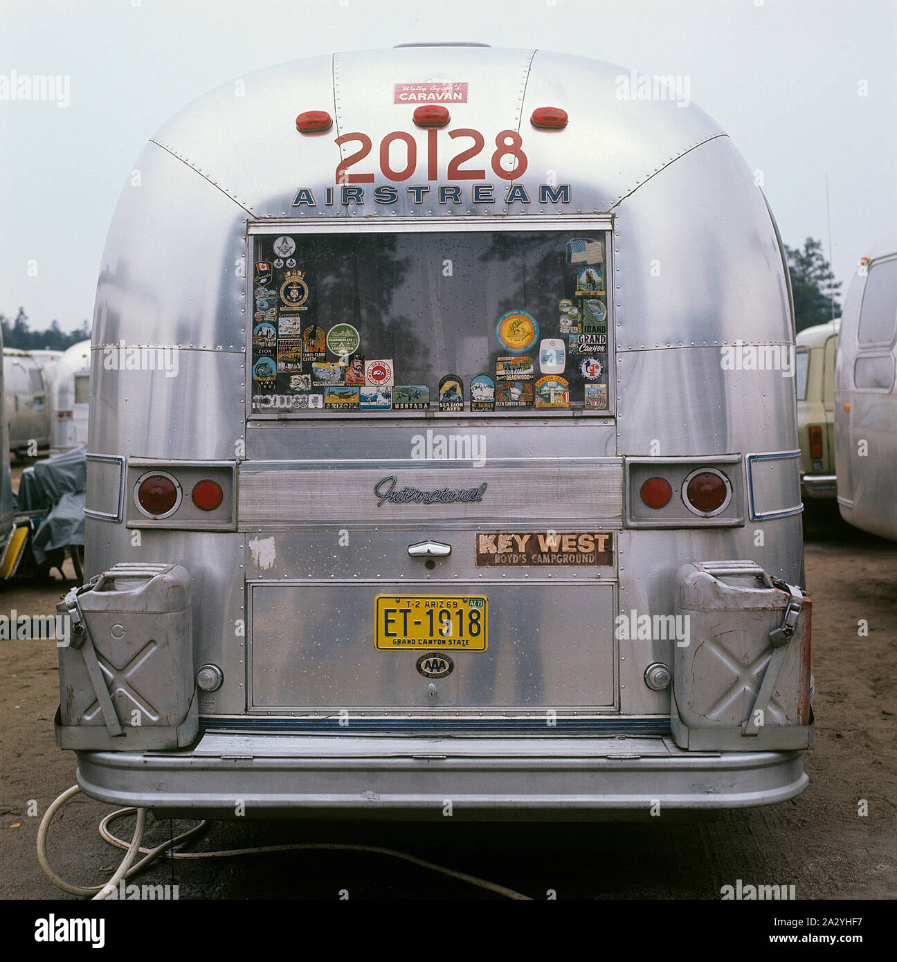 1970s camping. Pictured an American Airstream caravan in aluminium and ...