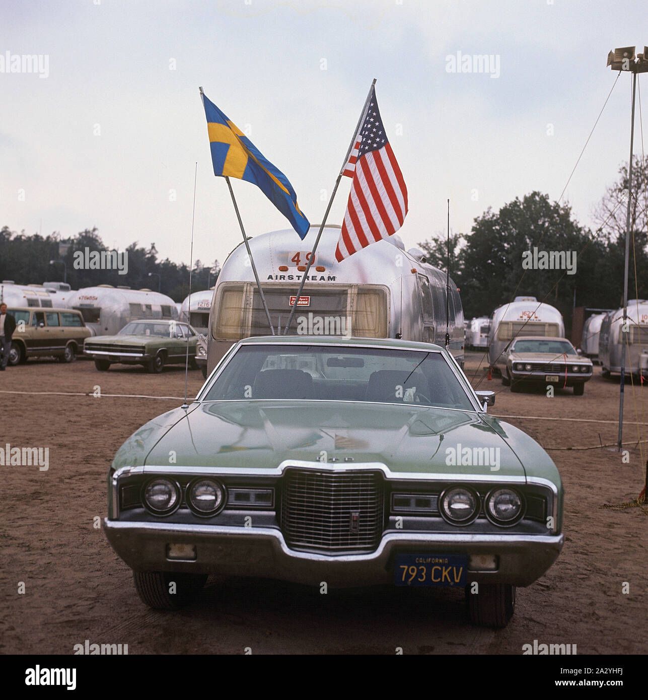 1970s camping. Pictured an American Airstream caravan in aluminium and ...