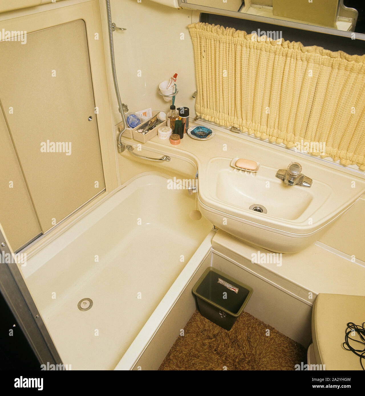 1970s camping. Pictured an American Airstream caravan in aluminium and ...