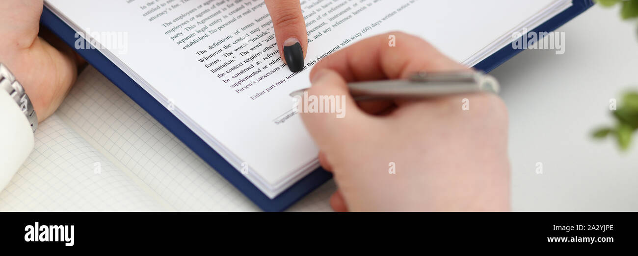 Arm fill and sign important form clipped to pad Stock Photo - Alamy