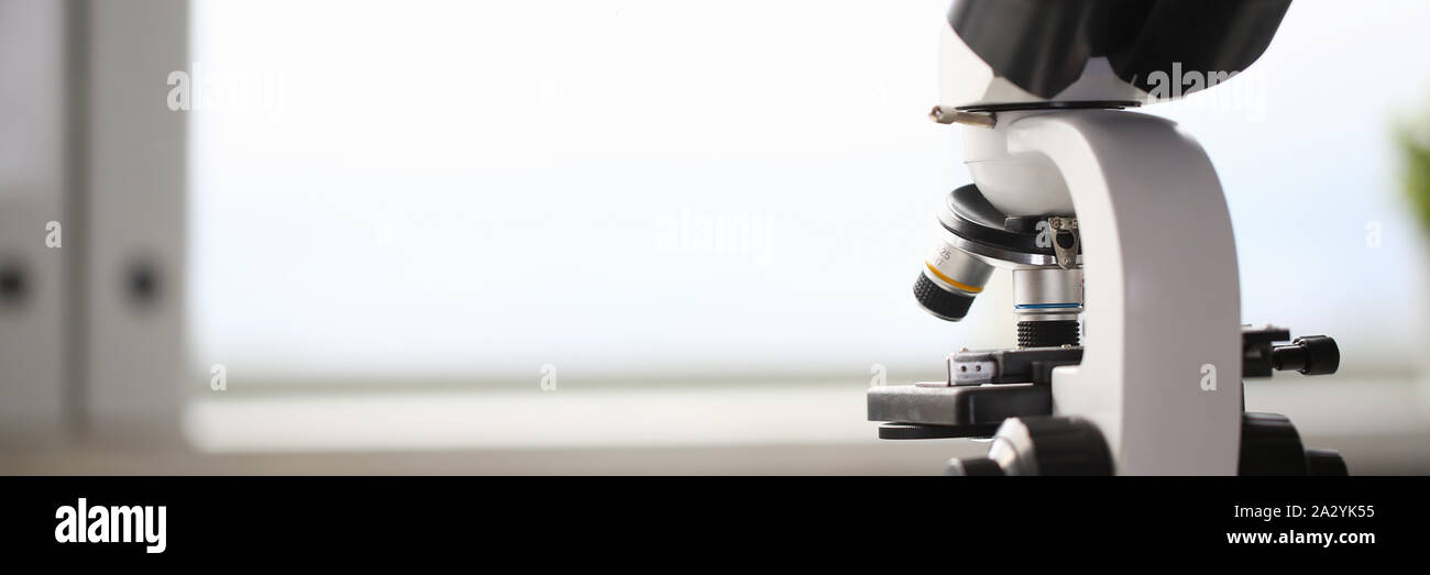 The head microscope on the background laboratory Stock Photo - Alamy