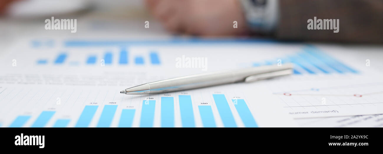 Group of people deliberate on problem with infographics Stock Photo - Alamy