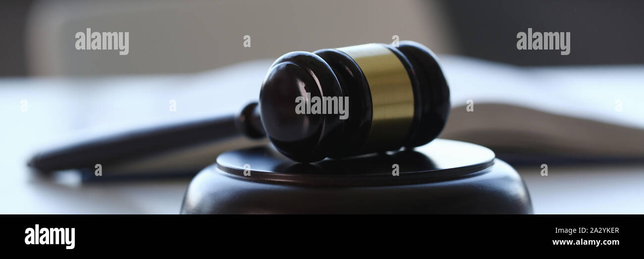 The judge hammer lies on table in Stock Photo - Alamy