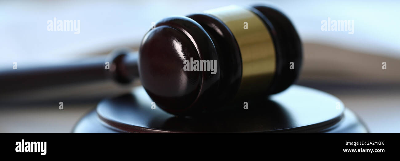 The judge hammer lies on table in Stock Photo - Alamy