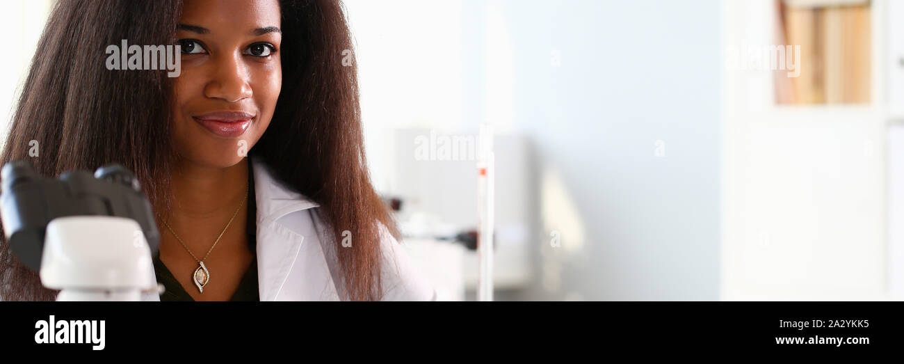 Black female chemist student conducting research Stock Photo - Alamy