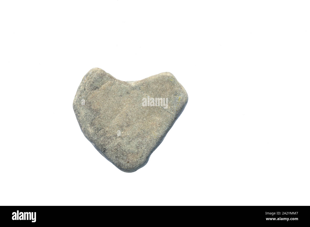 heart shaped stone. man with a stone heart. concept of cruel, callous ...
