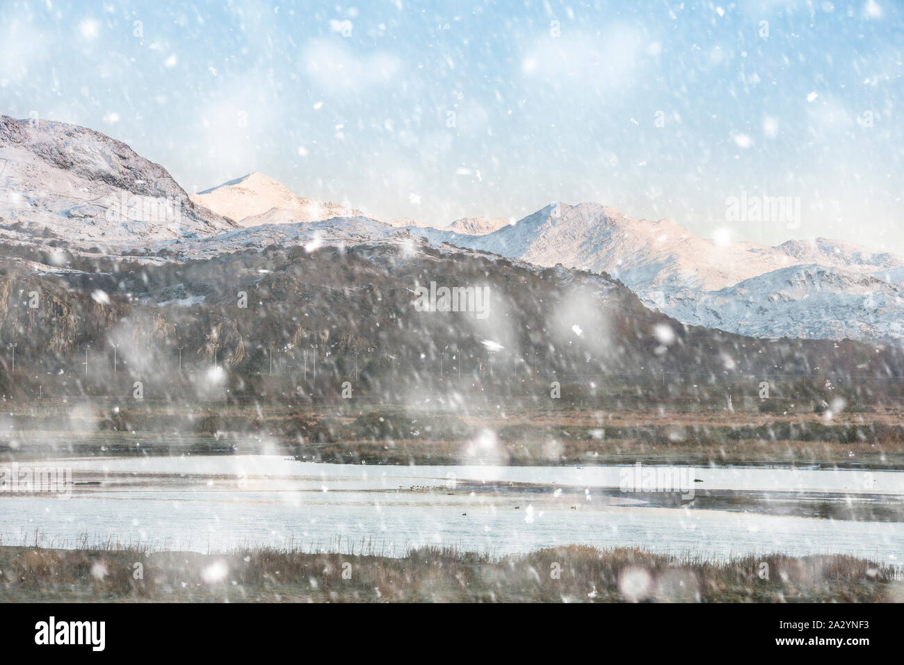 Beautiful Winter landscape image of Mount Snowdon and other peaks in ...
