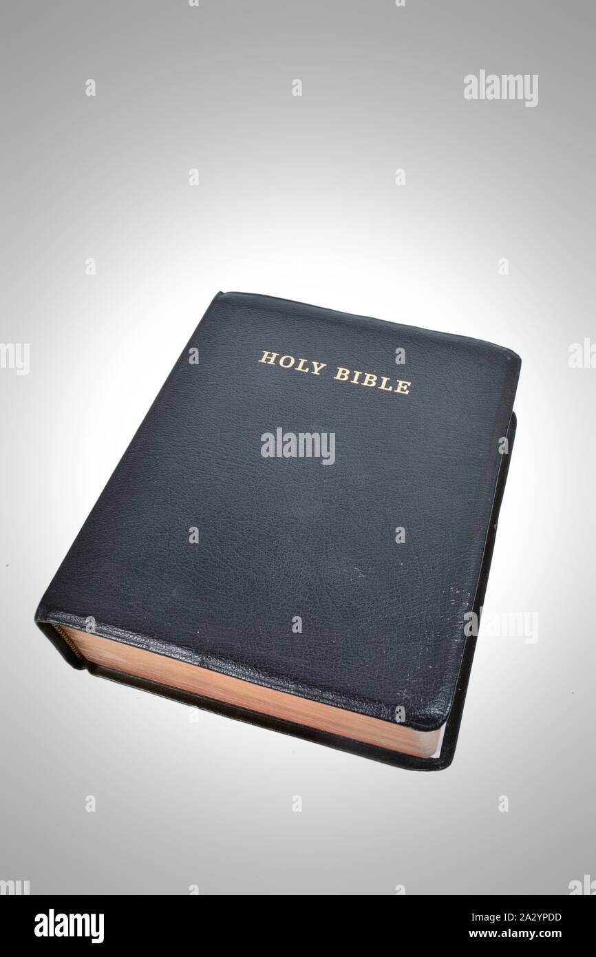 Closed bible with stylized background - Holy Bible Stock Photo - Alamy