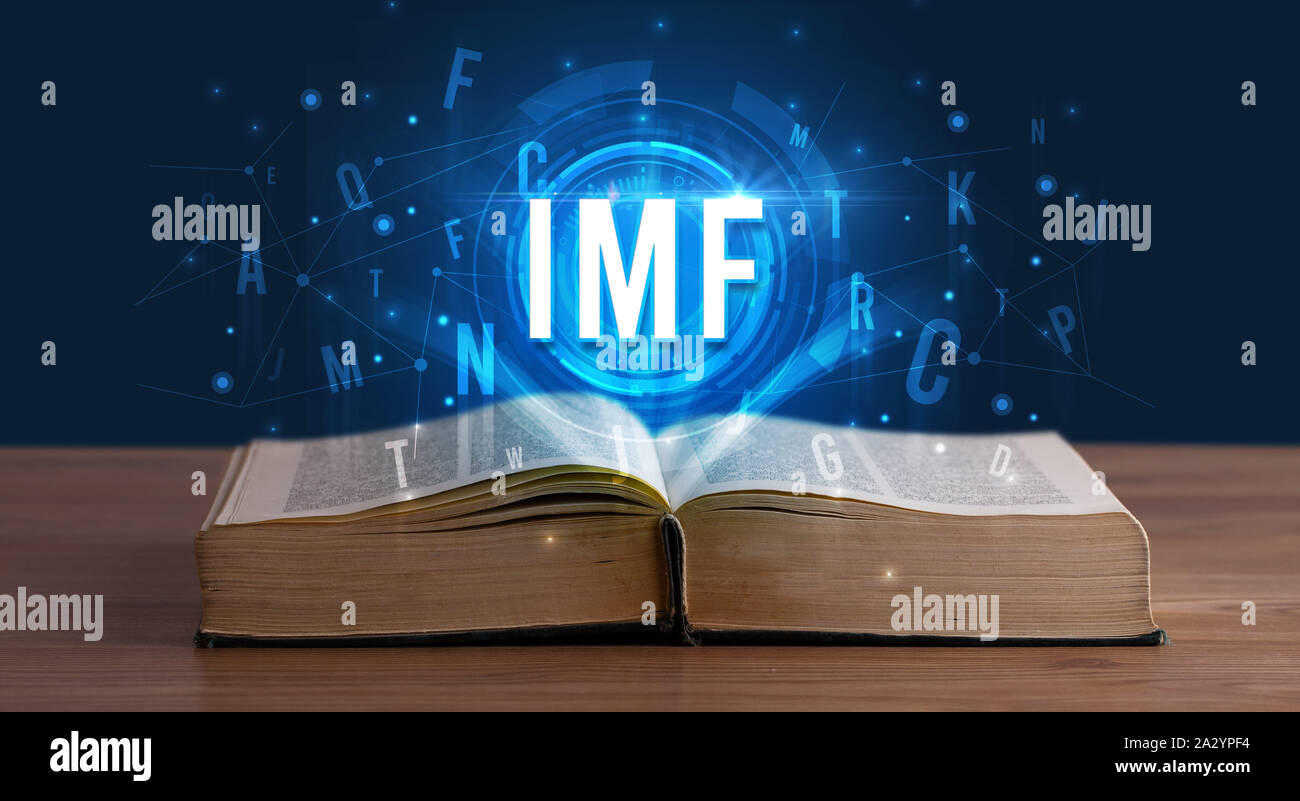 IMF inscription coming out from an open book, digital technology ...
