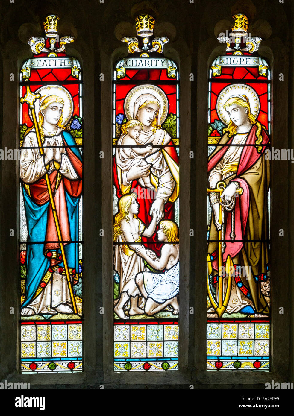 Faith hope charity stained glass hi-res stock photography and images ...
