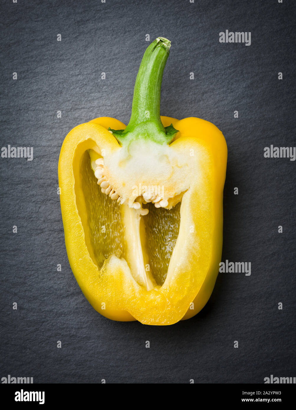 Yellow pepper cut in half hi-res stock photography and images - Alamy