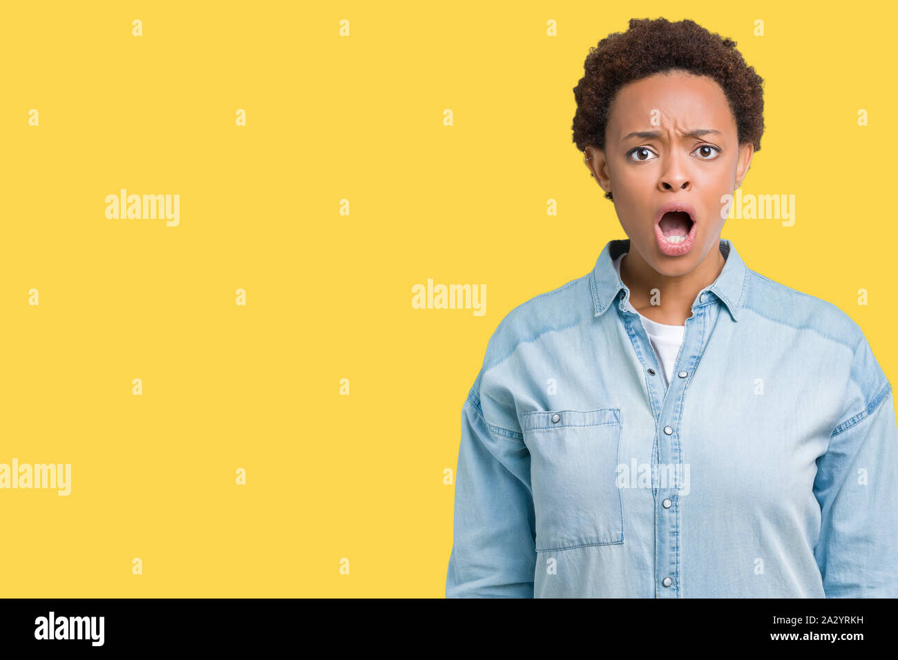 Young beautiful african american woman over isolated background In ...