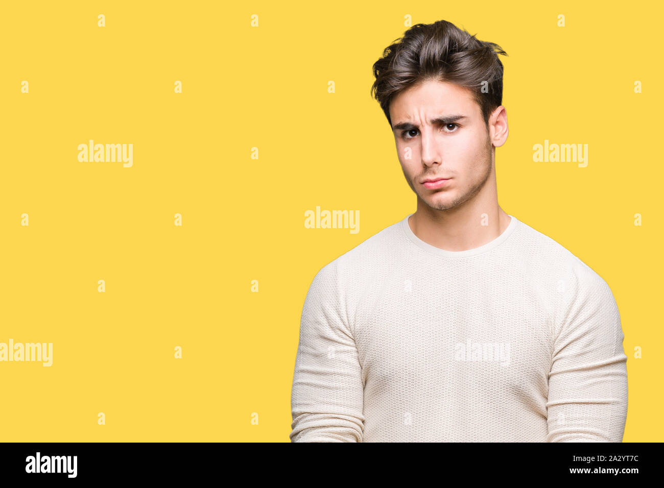 Young handsome man over isolated background depressed and worry for ...