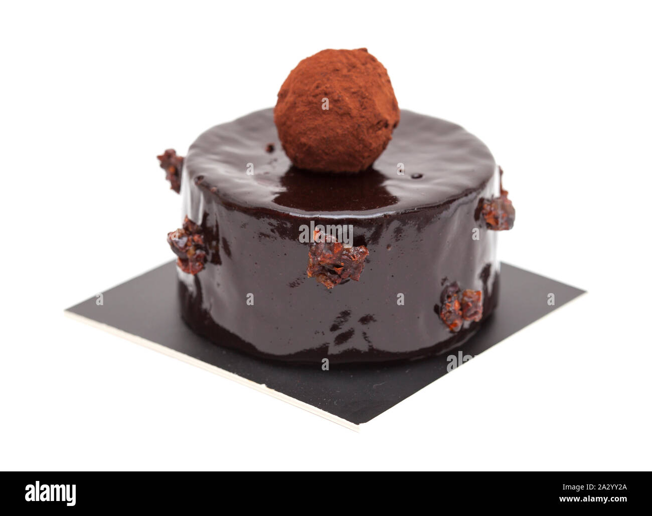 small individual mousse cake with mirror glaze isolated on white Stock ...