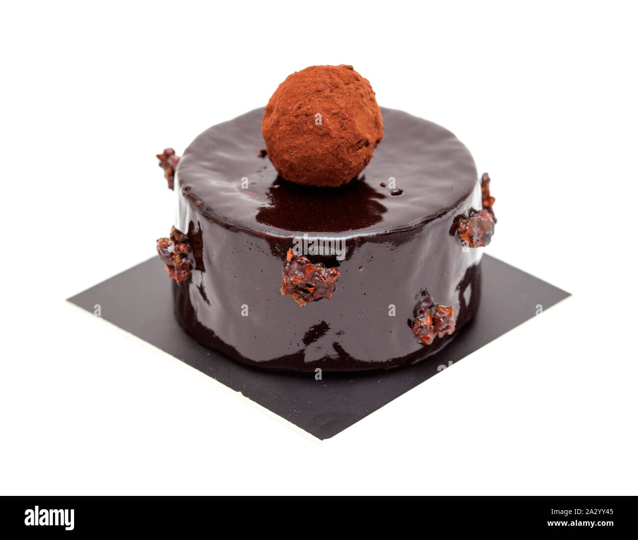 small individual mousse cake with mirror glaze isolated on white Stock ...