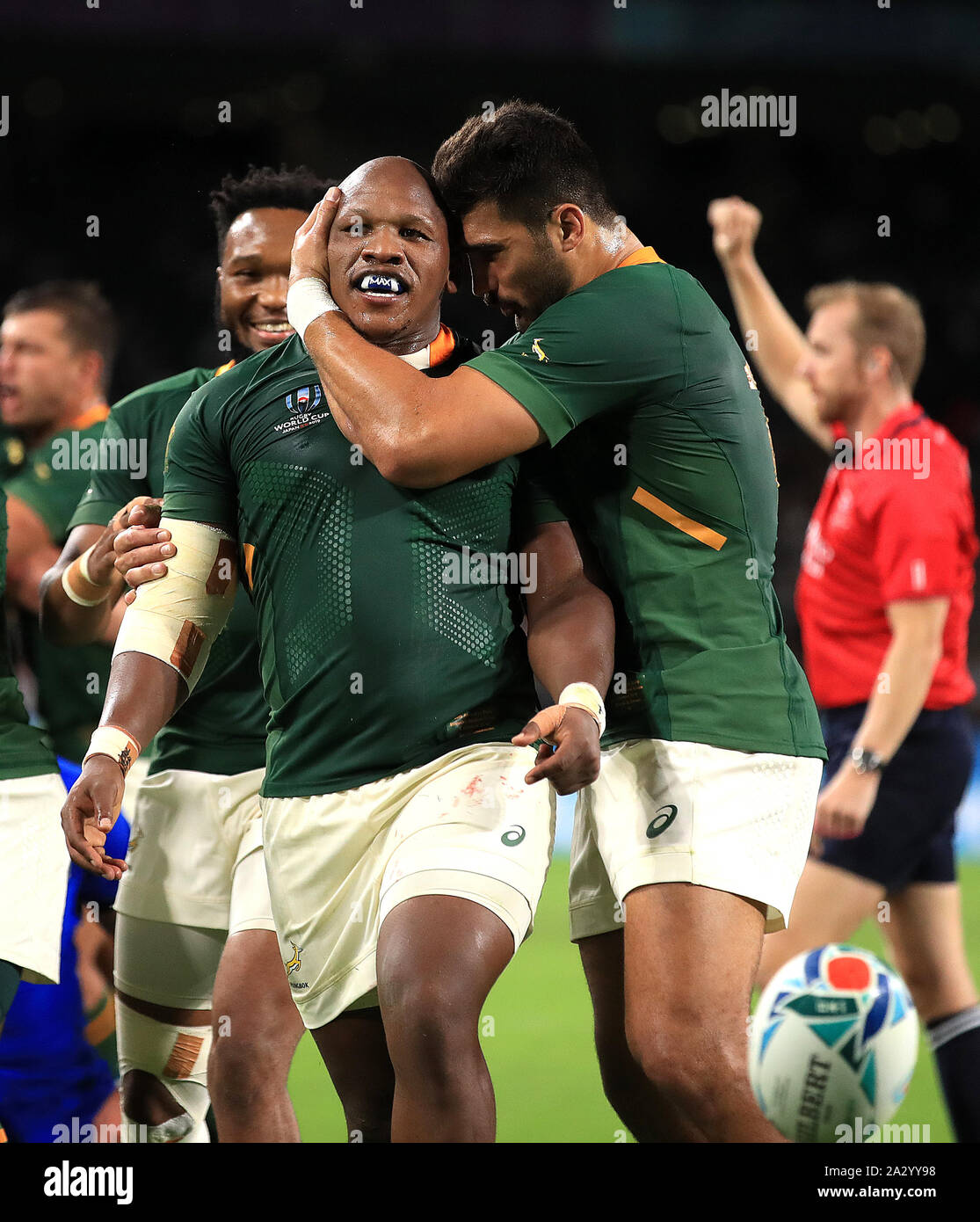 South Africa's Mbongeni Mbonambi (centre left) celebrates scoring his ...