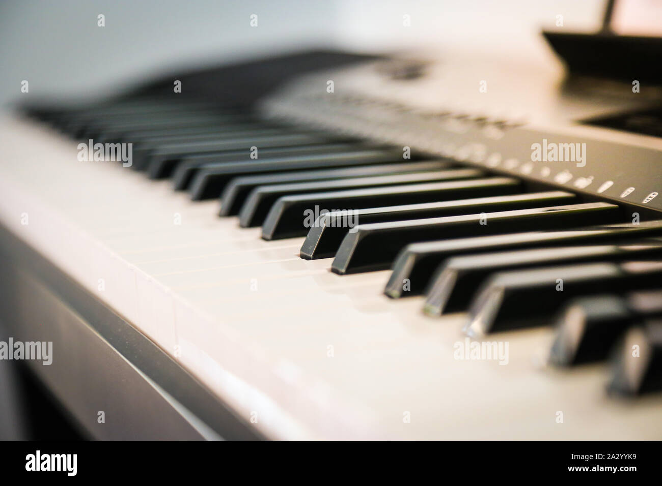 Piano, keyboard keys shot across the piano keys Stock Photo - Alamy