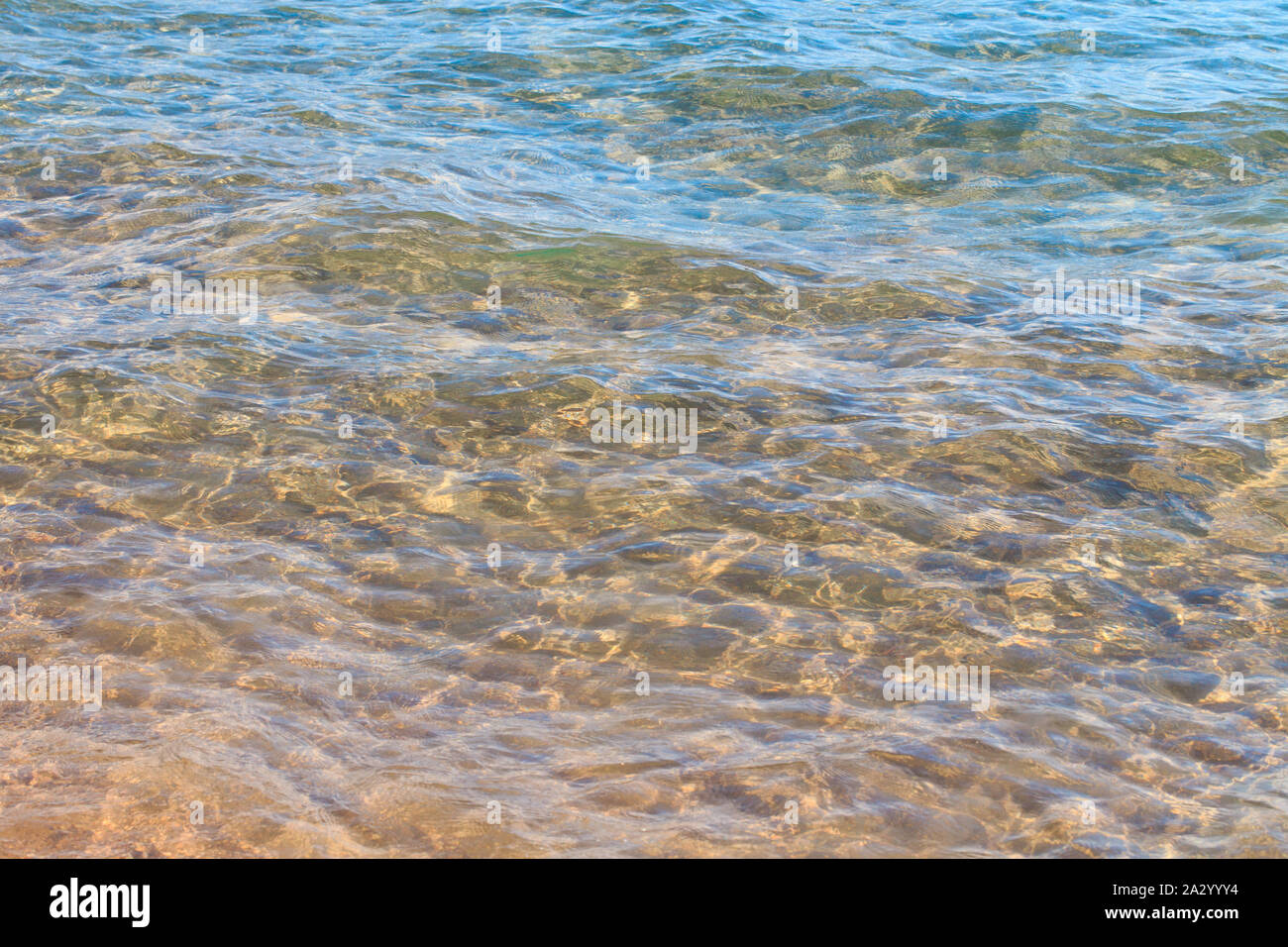 Clear water texture in blue and orange. Background of the ocean and the ...
