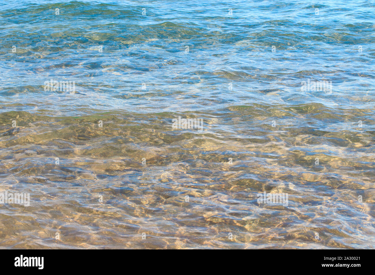 Clear water texture in blue and orange. Background of the ocean and the ...