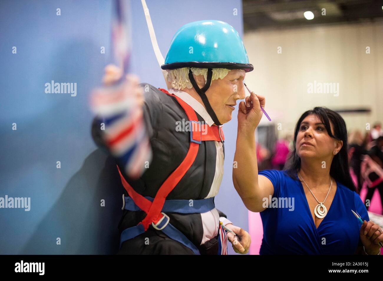 Cake maker Rosie Dummer makes the final touches to a life-sized Boris ...