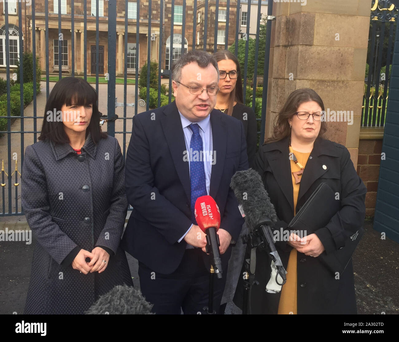 Alliance Party deputy leader Stephen Farry with party colleagues before ...