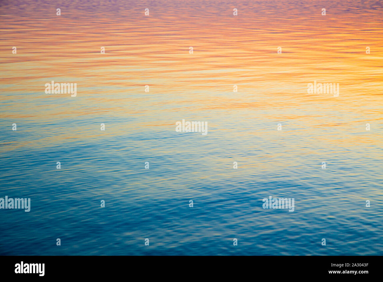Clear water texture in blue and orange. Background of the ocean and the ...