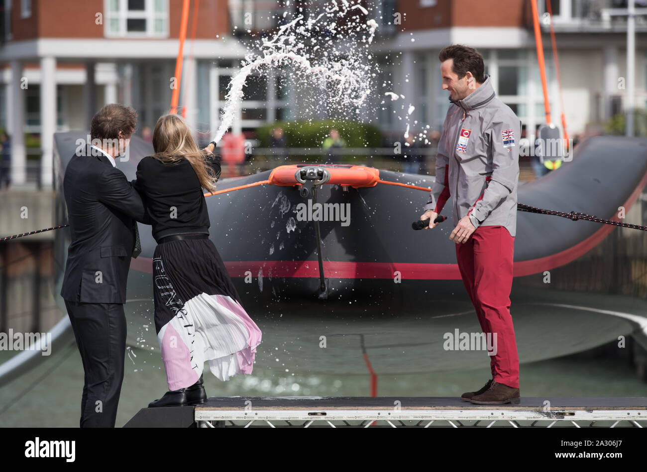 Sir Ben Ainslie (right) looks on as Sir Jim Ratcliffe (left) and his ...