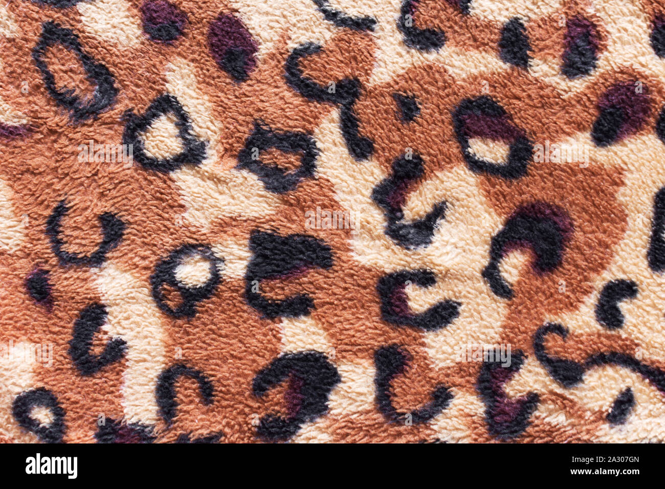 Tiger fablic texture. Fashion textile background Stock Photo - Alamy
