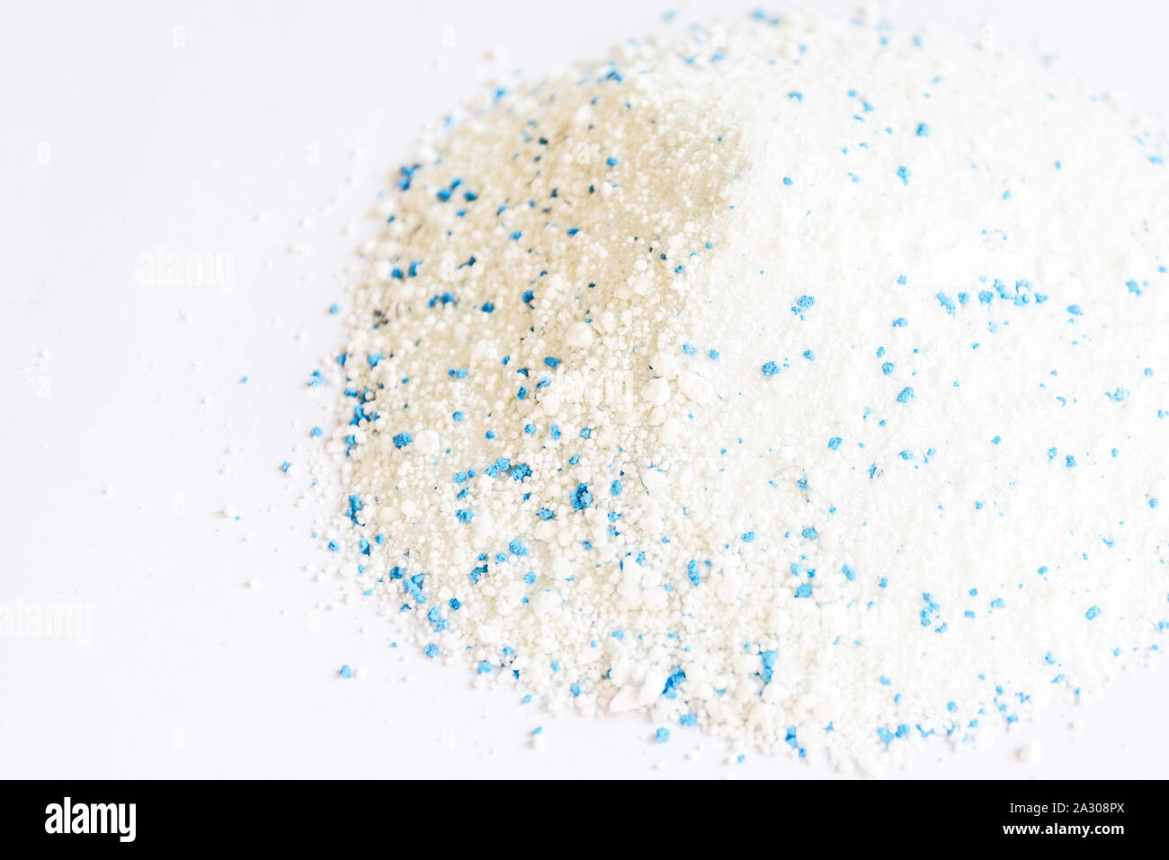 Colorful washing powder heap on white background. Laundry detergent ...